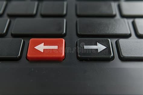 Two Arrow Keys On A Keyboard One Pointing Left And The Other Pointing