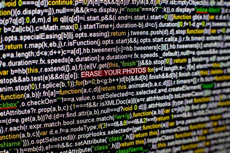 매크로 프로그램 소스 코드와 중간에 강조 표시 된 사진 지우기 비문 컴퓨터 화면 사진 그것에 바이러스와 함께 화면에 스크립트입니다 사이버 보안 개념입니다 기술 배경 Html