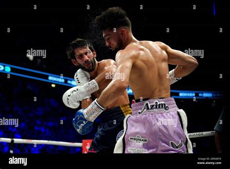 Aram Fanyan Left Strikes Adam Azim In The Super Lightweight Title Bout At The Ao Arena