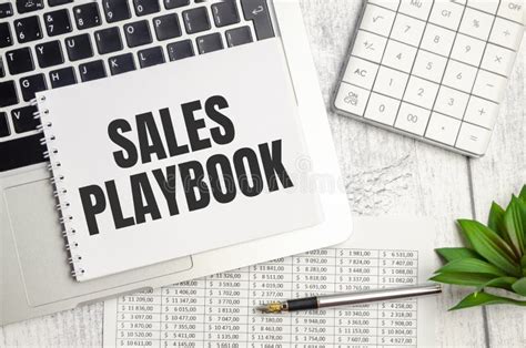 Sales Playbook Text And Notepad With Pen Charts And Calculator Stock Image Image Of