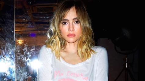 Curtain Bangs Are About To Be Literally Everywhere Galore