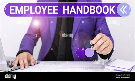 Text Sign Showing Employee Handbook Word Written On Document That Contains An Operating