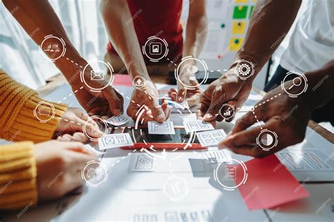 Premium Photo Ux Developer And Ui Designer Brainstorming About Mobile App Interface Wireframe
