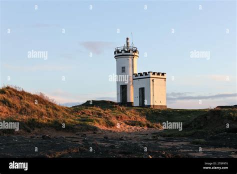 Elie Ness Lighthouse Reflection At Sunset Ruby Bay Elie Fife