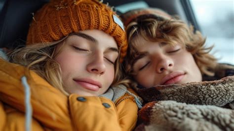Premium Photo Mother With Teen Son Sleep In Car Together In Winter