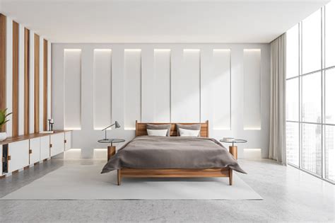 카펫에 침대가있는 흰색 침실 인테리어 회색 콘크리트 바닥 파노라마 창문 0명에 대한 스톡 사진 및 기타 이미지 0명 3차원 형태 가구 Istock