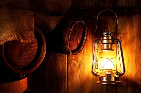 Premium Photo Lantern Hanging On Hook On Wooden Wall