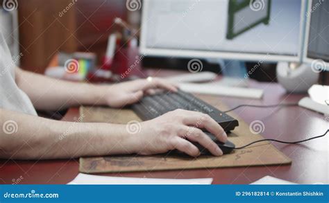 A Man Typing On A Computer Keyboard Producing Parts On A Lathe Stock Footage Video Of