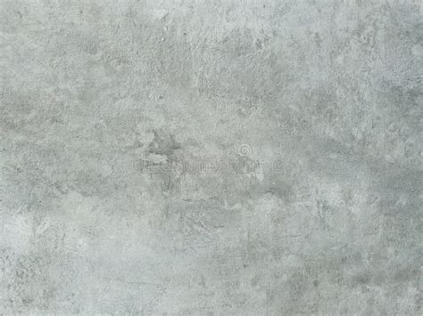 Detailed Close Up Of A Textured Light Grey Surface Resembling Aged Concrete Or Plaster With