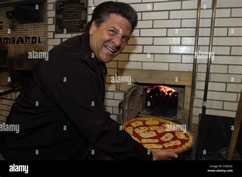 John Brescio Owner Of Lombardis With A Pizza Out Of The Oven Scott