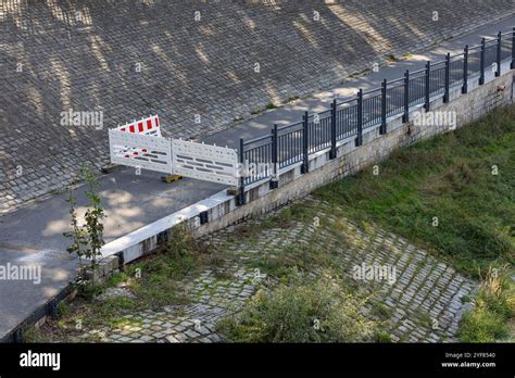 Closed Bike Path Next To River Blocked Due To Flooding After Heavy Rains Safety Barricades