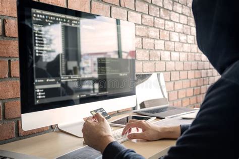 Computer Hacker Or Cyber Attack Concept Dangerous Hooded Hacker Using