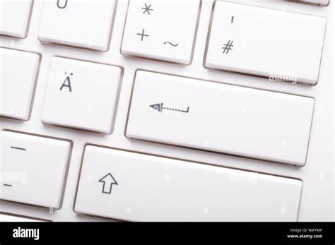 computer keyboard in white showing modern office work concept stock