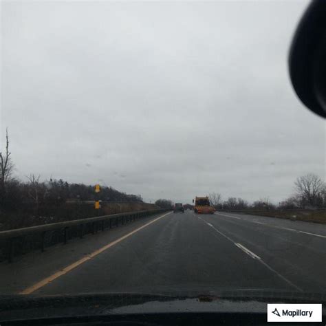 Vehicle Stopped With Hazard Lights On On Interstate Shoulder Onondaga