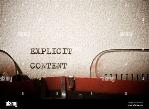Explicit Content Text Written With A Typewriter Stock Photo Alamy