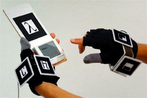 4 in this setup artoolkit markers are used to track the hands and an
