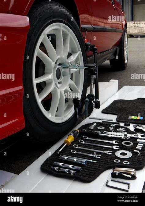 Car Wheel And Set Of Mounting And Adjustment Tools Stock Photo Stock Photo Alamy
