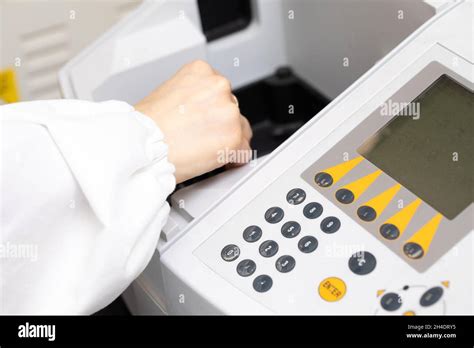 Scientist Performing Spectrophotometer Measurements Stock Photo Alamy