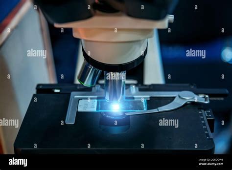 Scientific Or Medical Test Sample Under Light Microscope In Laboratory Close Up Stock Photo Alamy