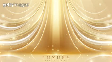 Elegant abstract background of golden swirls line with shimmering particles and bokeh ...