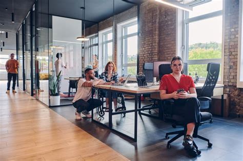 A Diverse Group Of Business Professionals Collaborates In A Modern