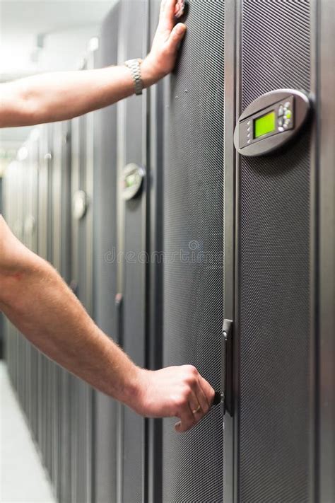 Man Controls The Server Rack Stock Photo Image Of Multiple Drive