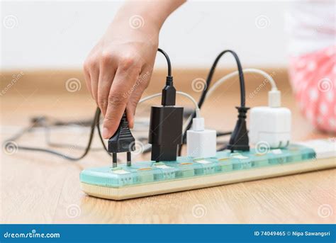 Woman Unplugged Plug To Save On Energy Stock Image Image Of Electric Environmental 74049465