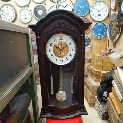 Jual Jam Dinding Klasik Kuno Bunyi Setiap Jam Dan Bandul Bergoyang Ukuran 67x35cm Setiap Jam