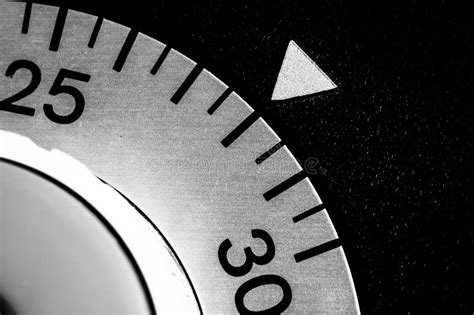 Monochrome Close Up Of An Old Analog Laboratory Timer Set To 28 Stock