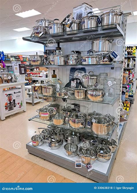 The Kitchenware Section Of A Large Store A Counter With Steel Pots With Glass Lids Editorial