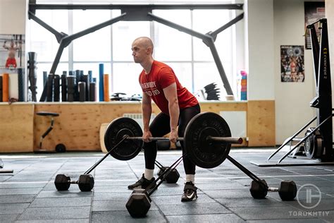 Barbell Deadlift With Resistance Bands To Boost Your Training