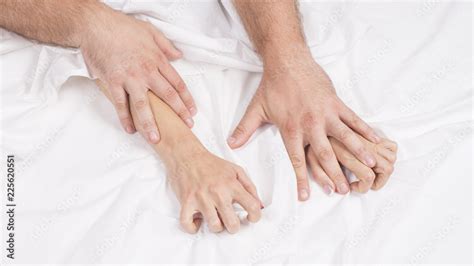 Sensual Beautiful Young Couple Is Having Sex On Bed Female Hand