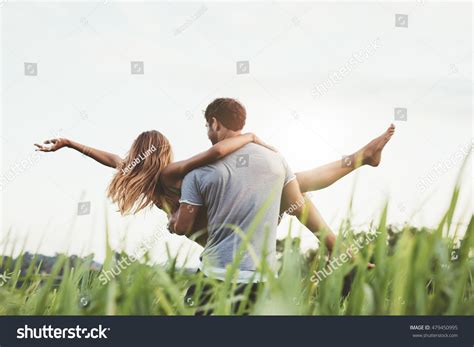 Rear View Shot Man Carrying Woman Stock Photo Shutterstock