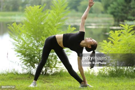 Extended Triangle Pose Photos And Premium High Res Pictures Getty Images