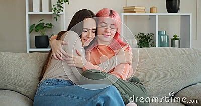 Gay Woman Embracing Her Girlfriend On Sofa At Home Stock Video Video Of Embracing Romance