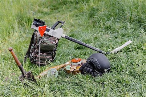 Premium Photo Explosive Devices And A Metal Detector Lie On The