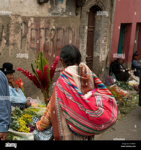 Bolivian Woman Or Cholita With A Sling In At A Flower Market In La Paz Bolivia Stock Photo Alamy