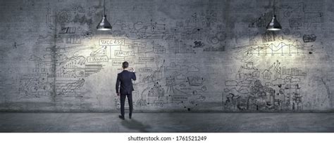 Back View Man Drawing Business Sketch Stock Photo 1761521249 Shutterstock