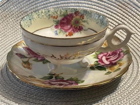Vintage Royal Sealy China Japan Flowers” Three Footed Teacup And