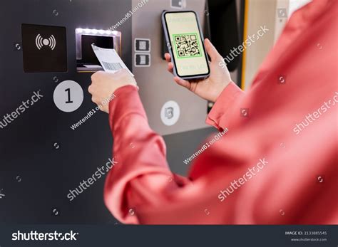 Woman Scanning Qr Code On Ticket Stock Photo Shutterstock