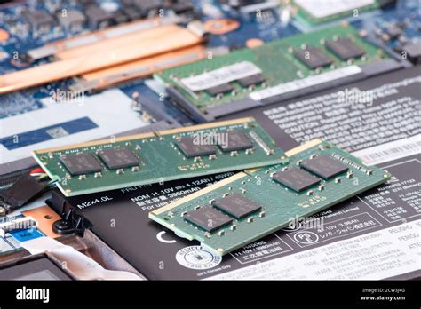 Image Depicting An Open Laptop Computer With Memory Or RAM Sticks Ready To Upgrade The Internal