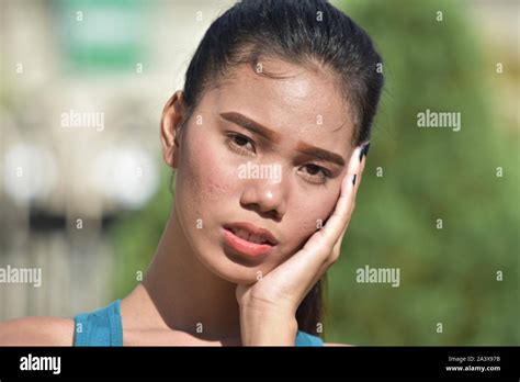 An Unhappy Filipina Woman Stock Photo Alamy