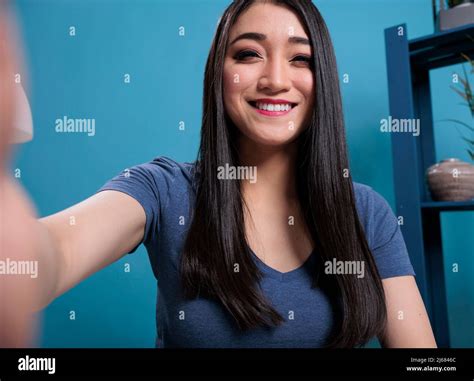 Pov Of Social Media Influencer Smiling At Camera While Recording Tutorial For Vlogging Channel