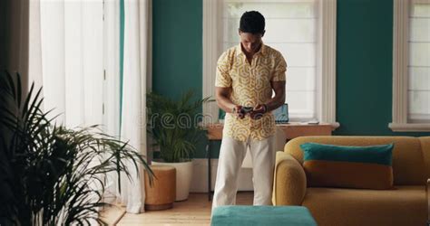 Laughing Man And Typing With Phone In Home For Funny Text Message