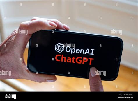 Person Holds Mobile Phone Showing Microsoft Chatgpt Openai Chatbot Logo