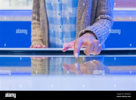 Woman Using Multimedia Touchscreen Display Of Interactive Kiosk Stock Photo Alamy