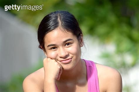 A Cute Filipina Girl Deciding