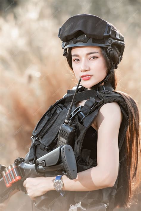 Premium Photo Portrait Of Beautiful Sexy Woman With Shotgun And