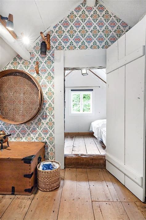 Cozy Cottage Bedroom With Wood Floors And Wallpaper Attic Bedroom