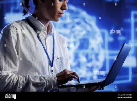 system administrator using laptop to maintenance artificial